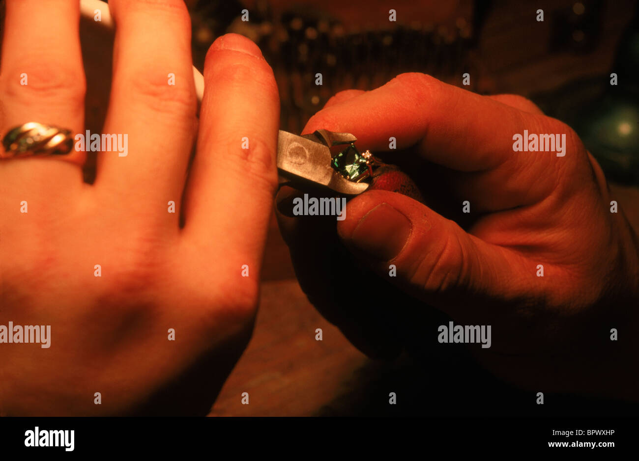 Jeweler measuring hi-res stock photography and images - Alamy