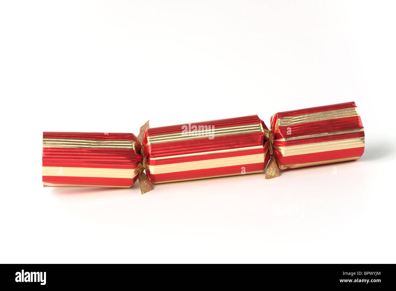 Red and gold elegant large Christmas cracker Stock Photo - Alamy