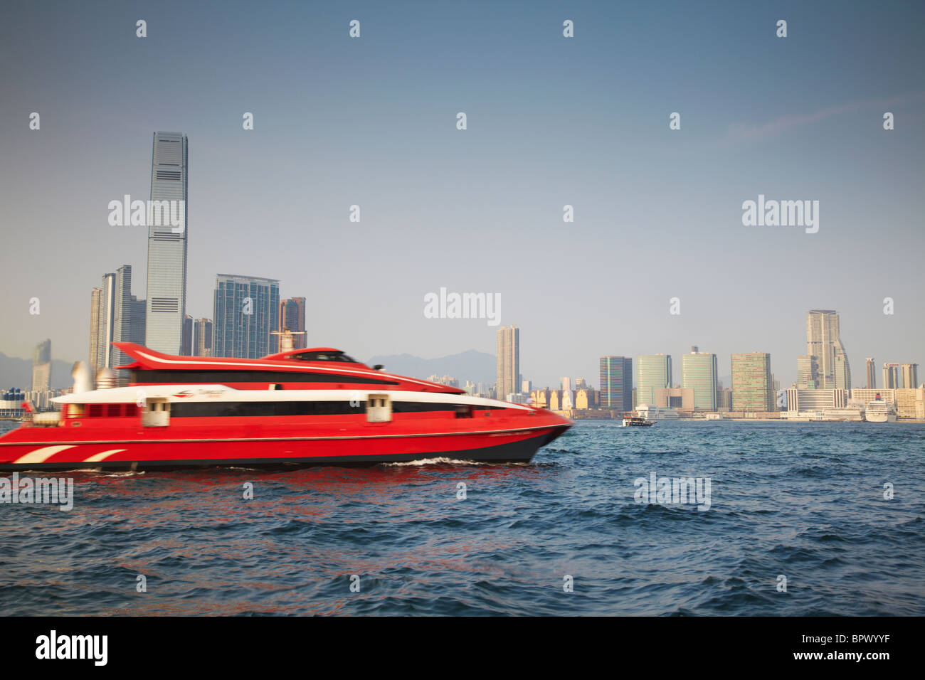 Macau ferry passing Kowloon skyline in Victoria Harbour, Hong Kong ...