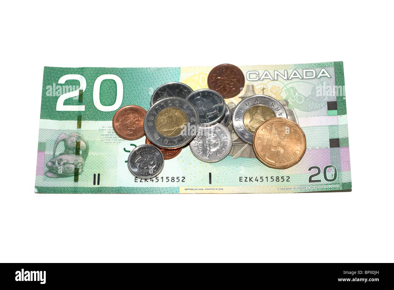 Canadian twenty dollar bill and coins Stock Photo - Alamy
