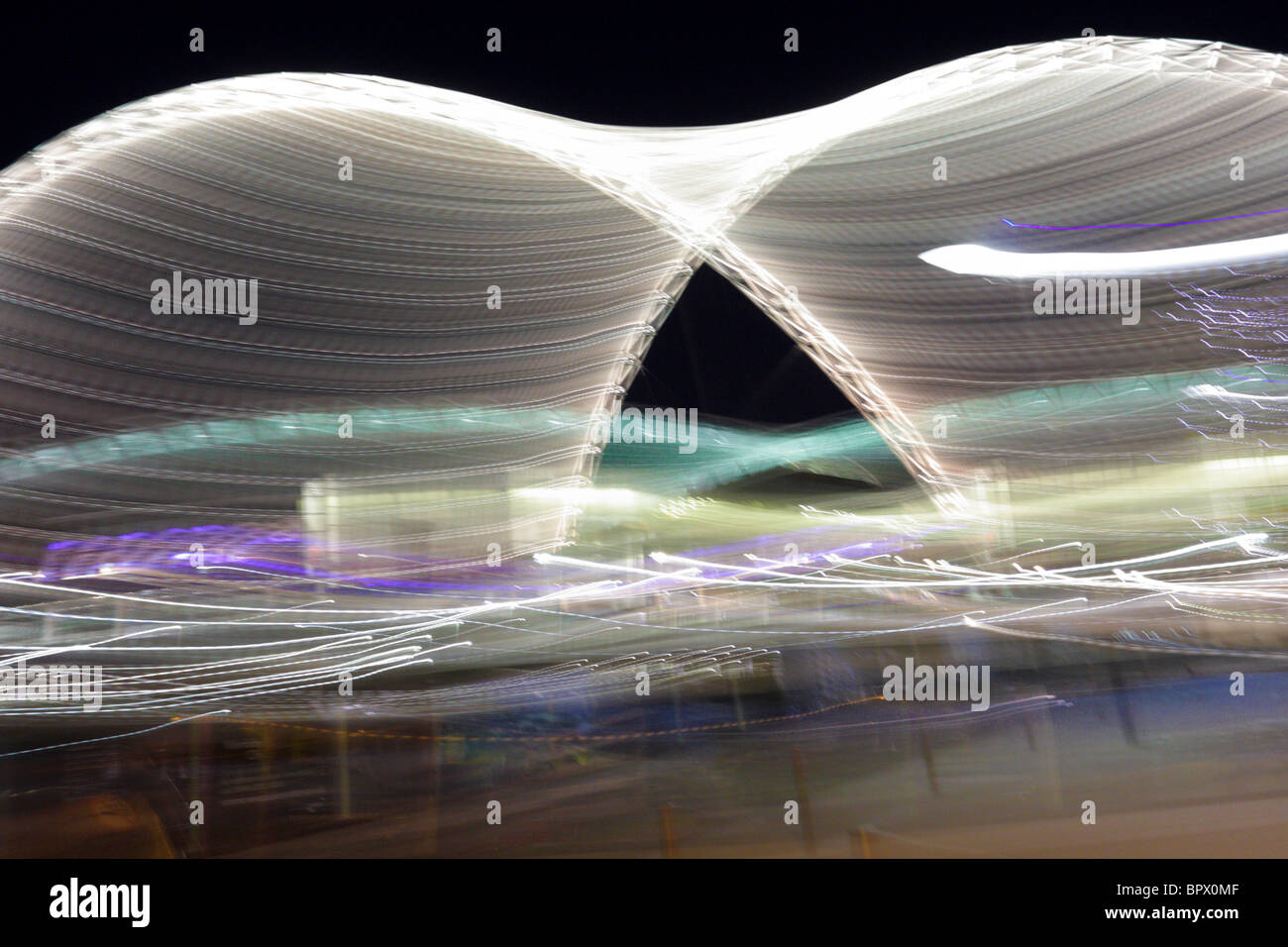 Abstract light streams captured at night using pan and shift method ...