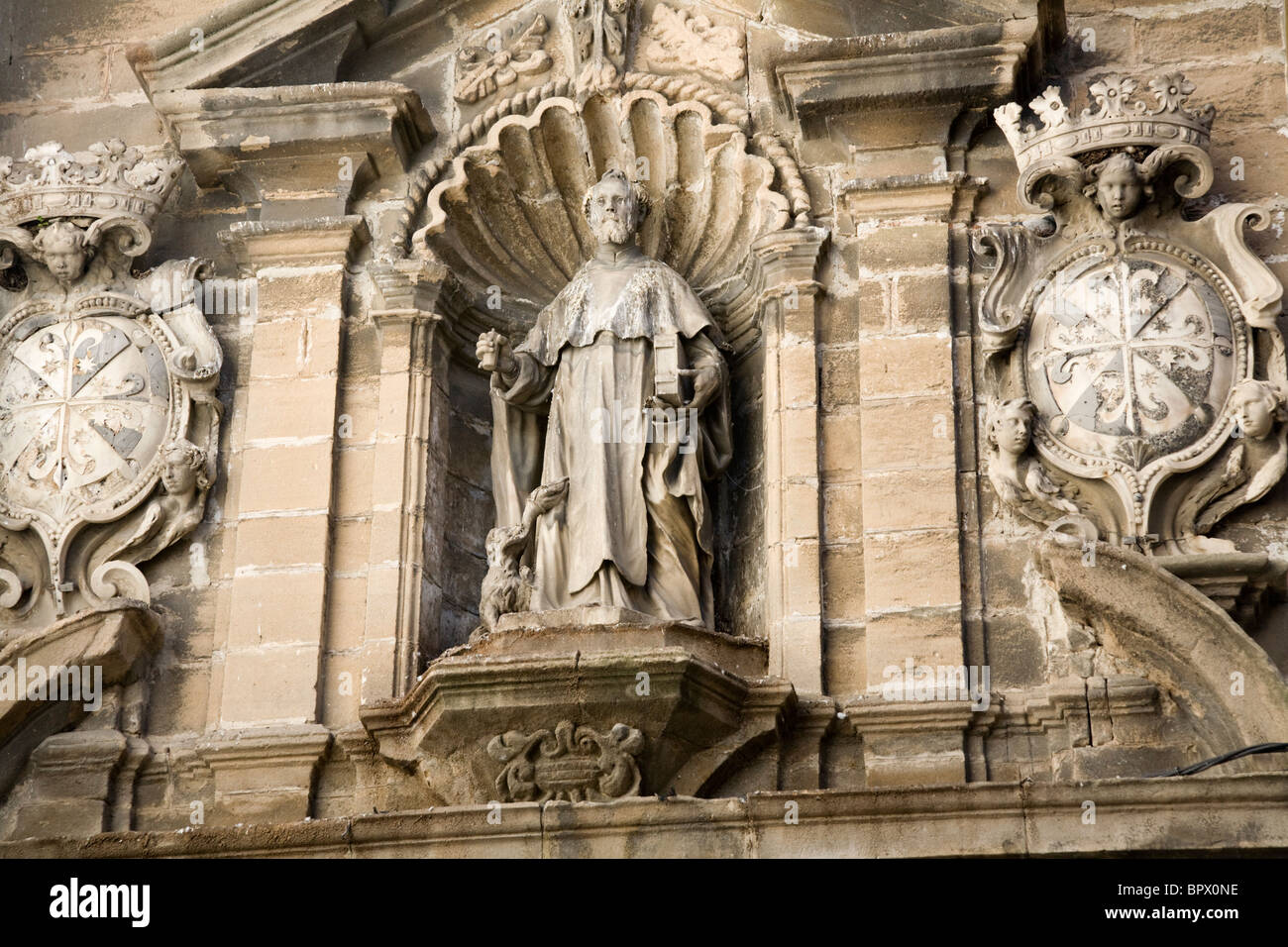 Stone monument / carving on gates / gate / entrance arch of city wall ...