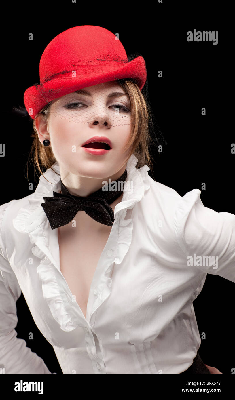 Portrait of a pretty young woman with red bonnet Stock Photo - Alamy