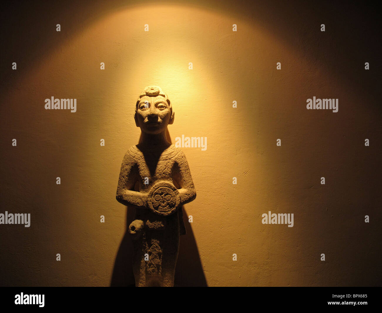 A replica of a Mayan statue sits on display in a hotel in Merida ...