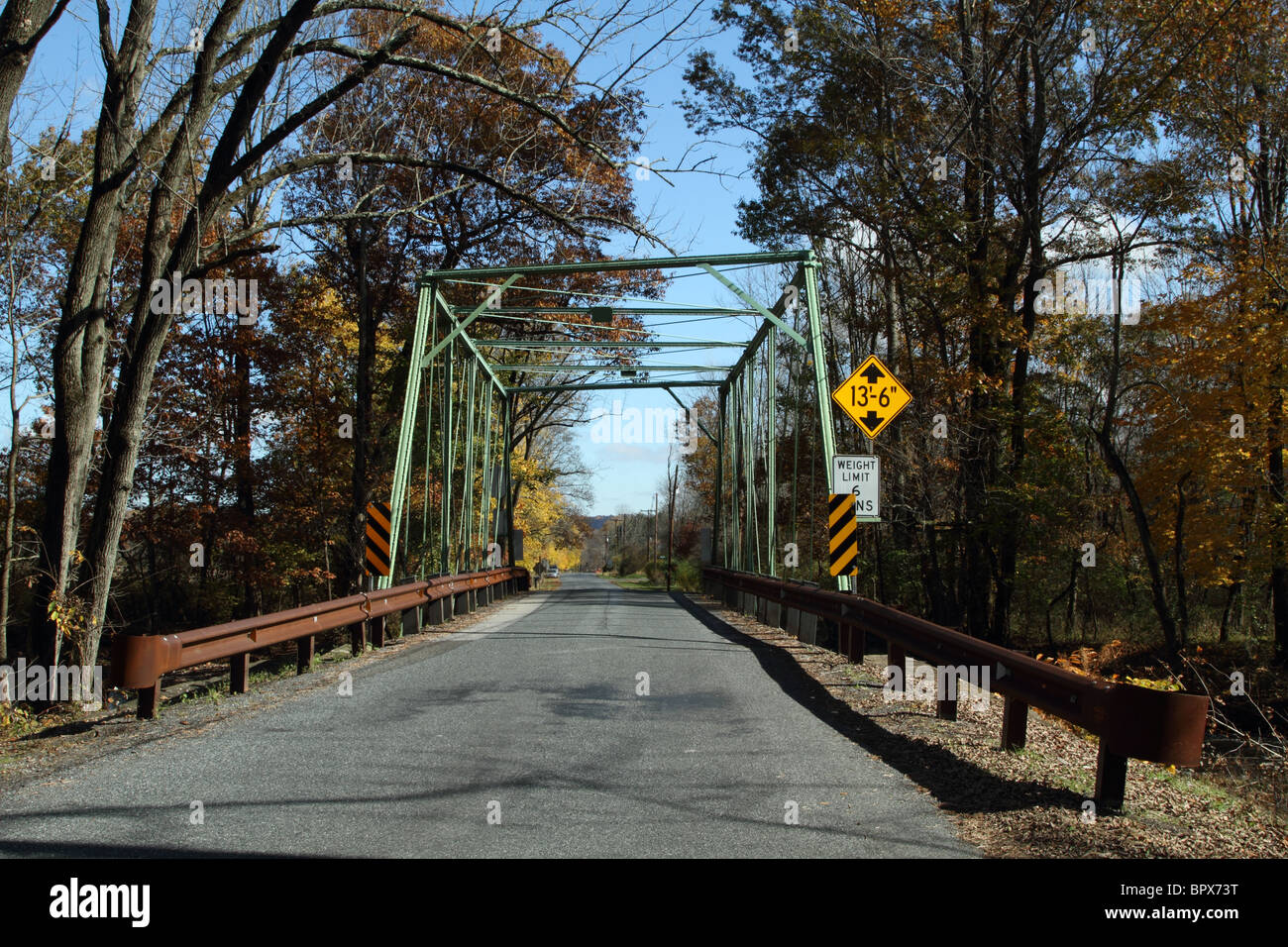 Bridge and country road Stock Photo - Alamy