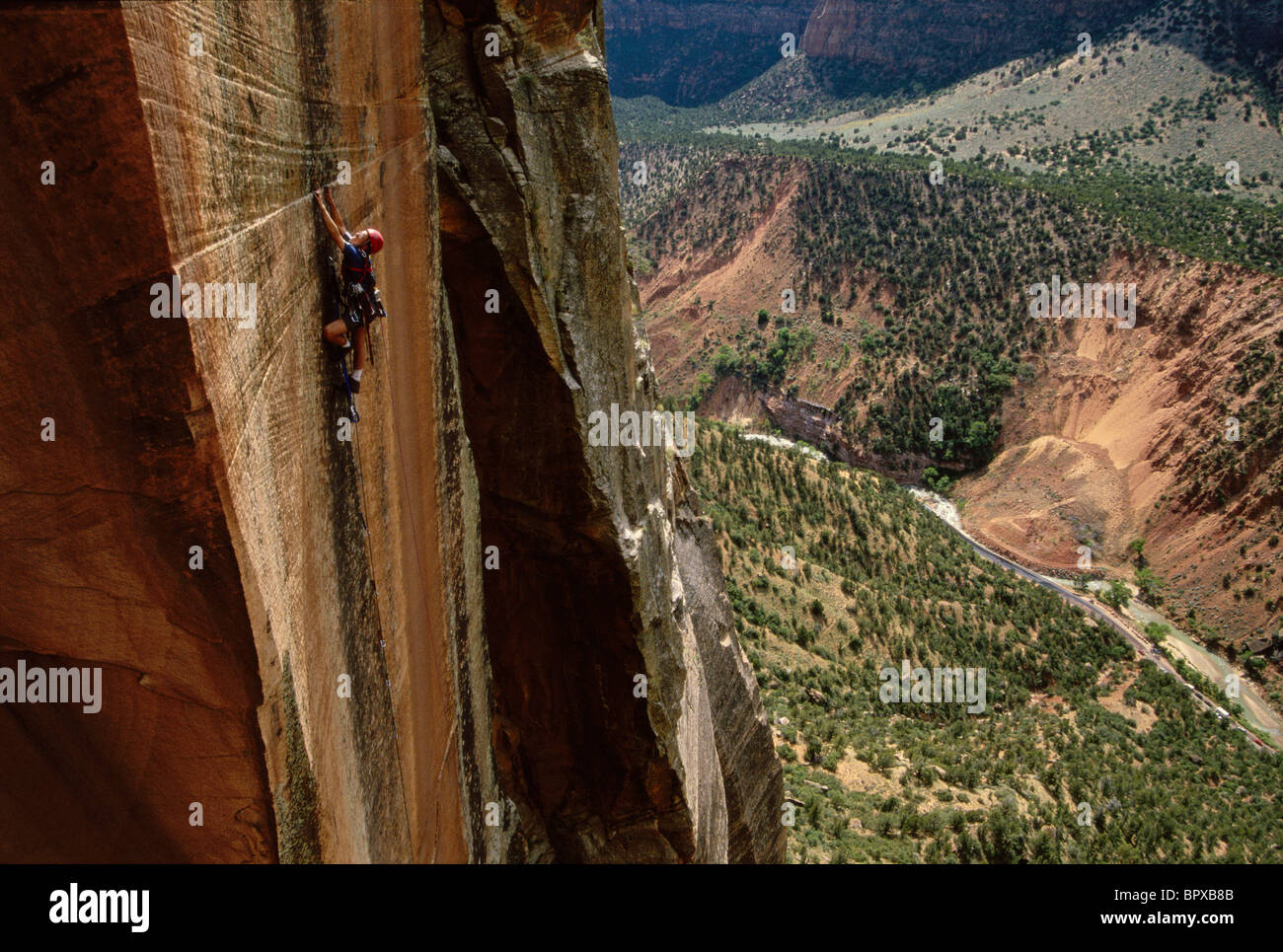 Big Wall Aid climber on a vertical wall in Zion National Park, Utah ...