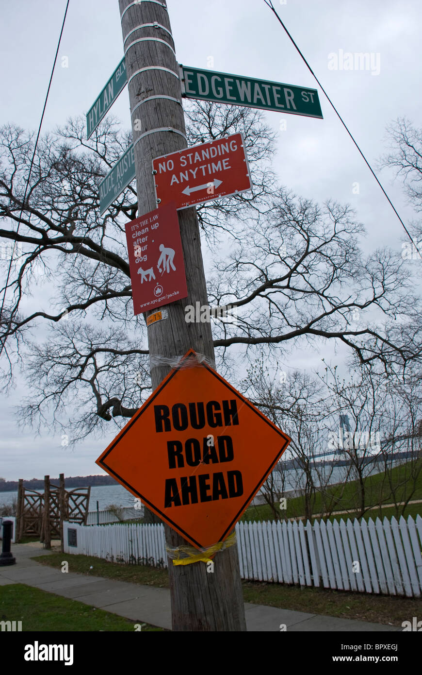 Residential neighborhood telephone pole with multiple instructional ...