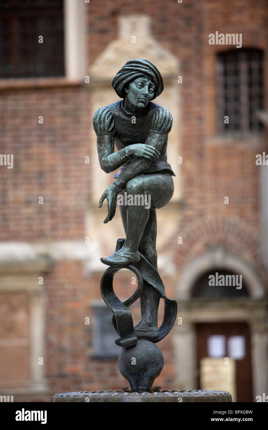 A statue outside St Marys Church in the main square of Krakow, Poland ...