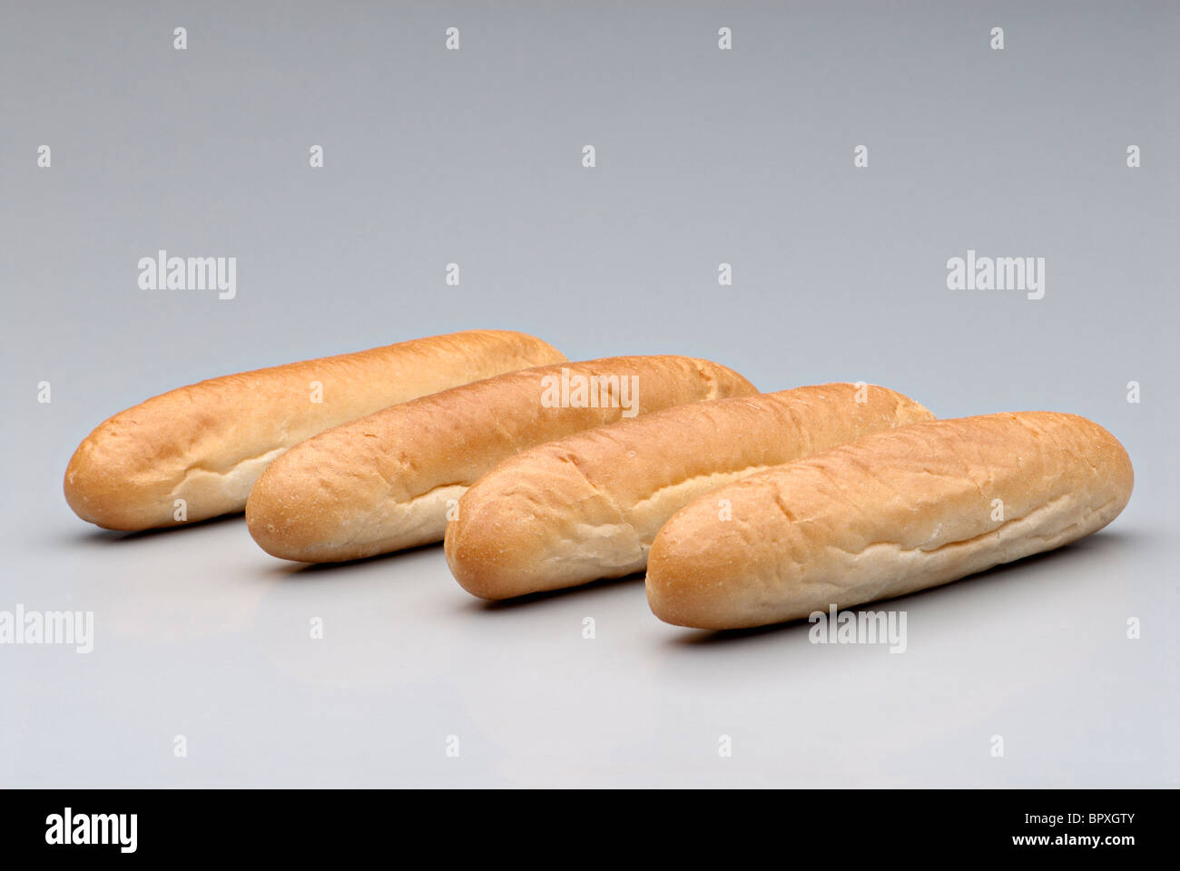 Four hot dog breads Stock Photo - Alamy