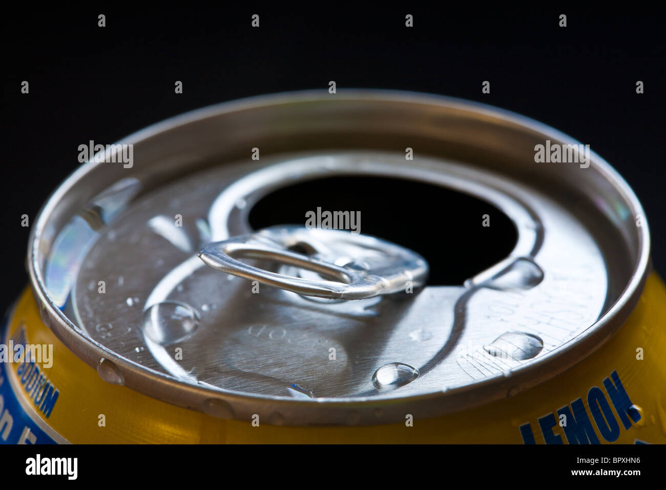 Top of beer can with droplets of water condensation hi-res stock ...