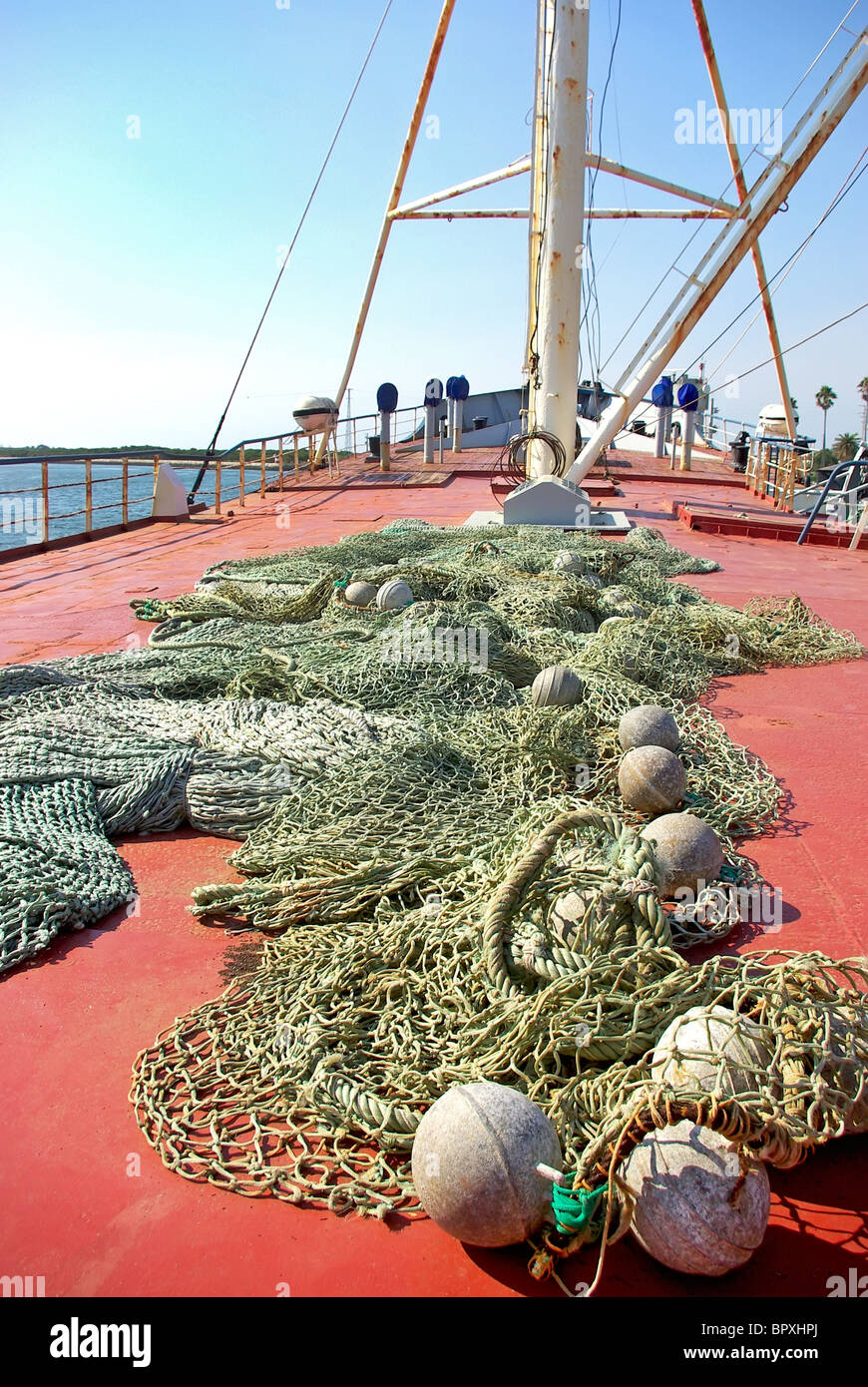 Ship and nets Stock Photo - Alamy