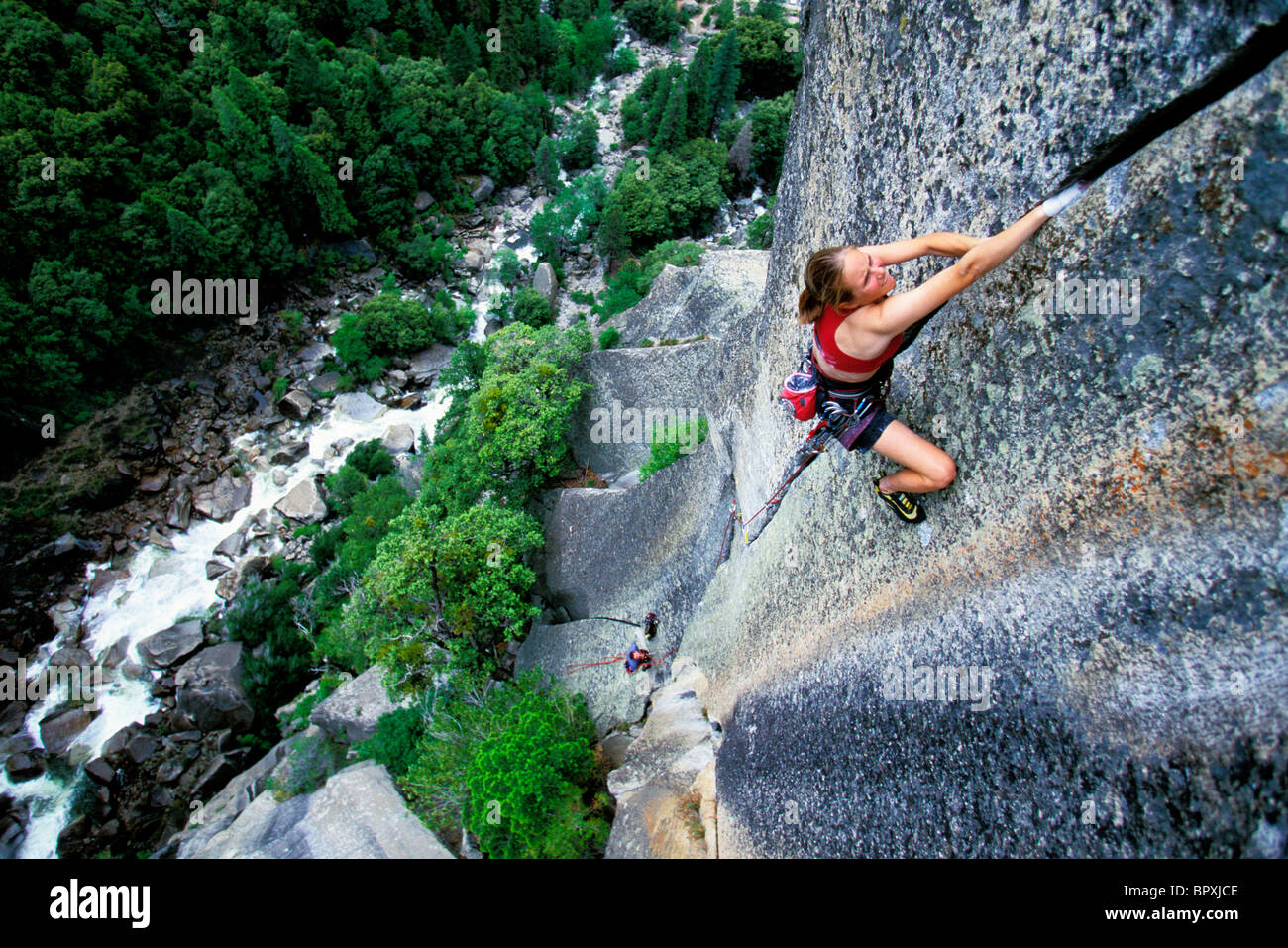 A woman rock climbing Stock Photo - Alamy