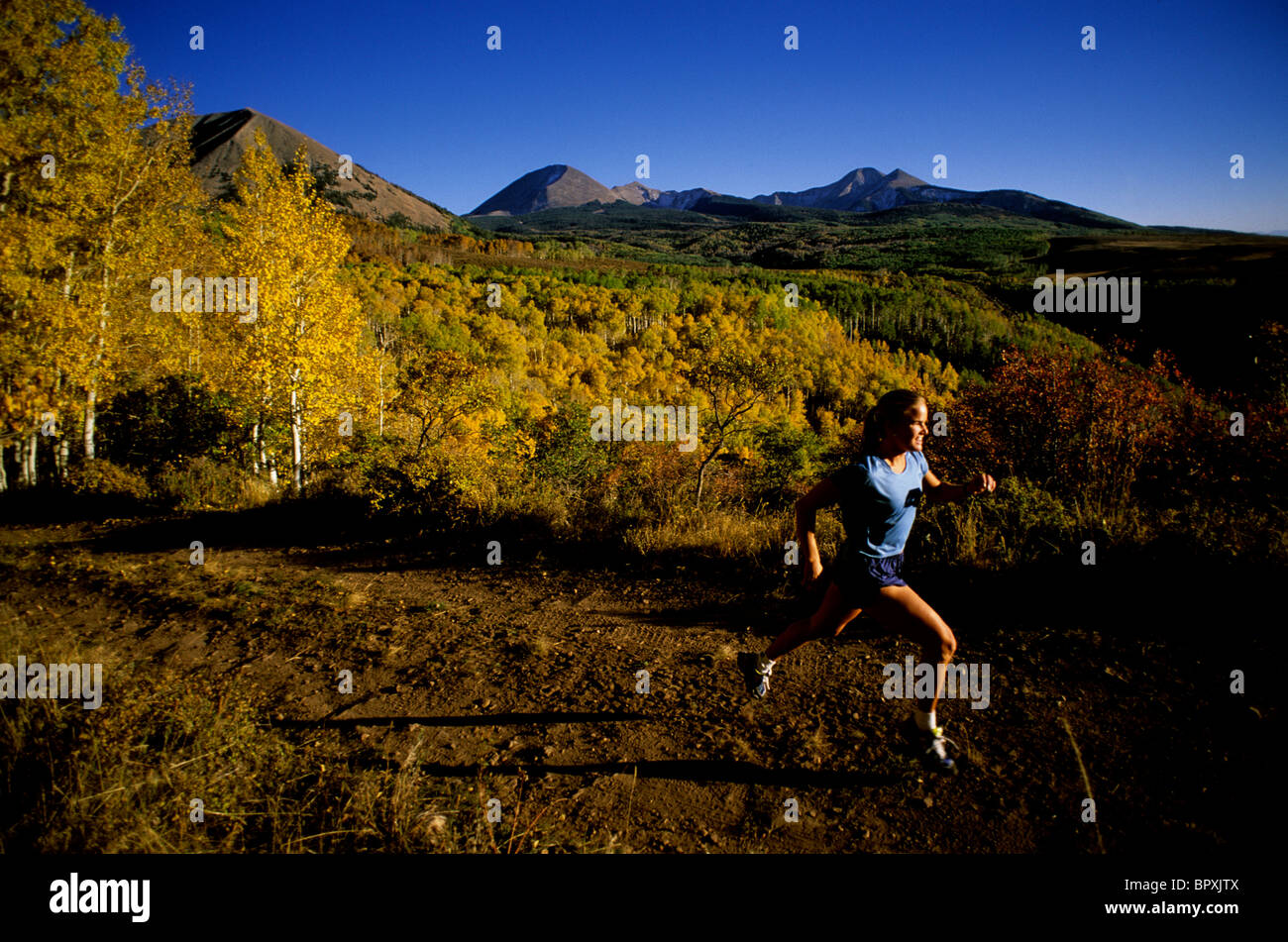 Female runner in Moab, Utah Stock Photo - Alamy