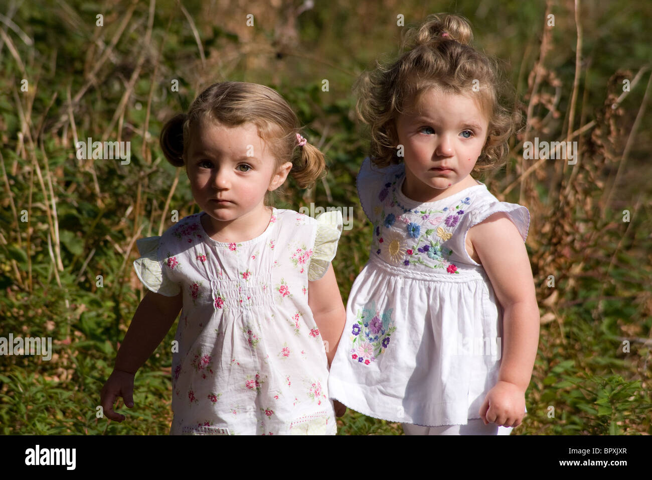 baby toddler child pose engaging face expression Stock Photo - Alamy