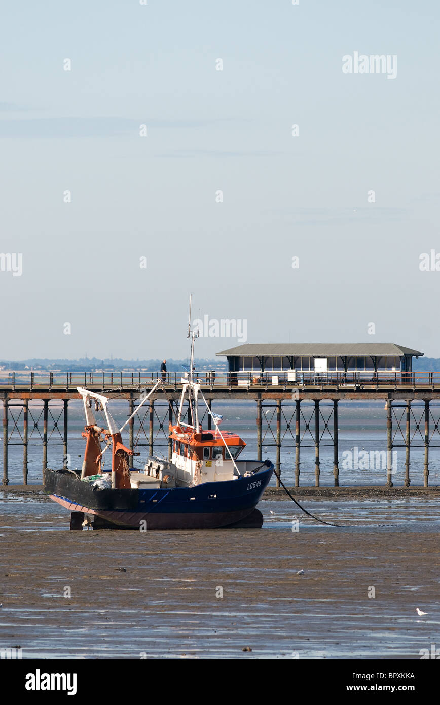 Fishing boat beached at low tide hi-res stock photography and images ...