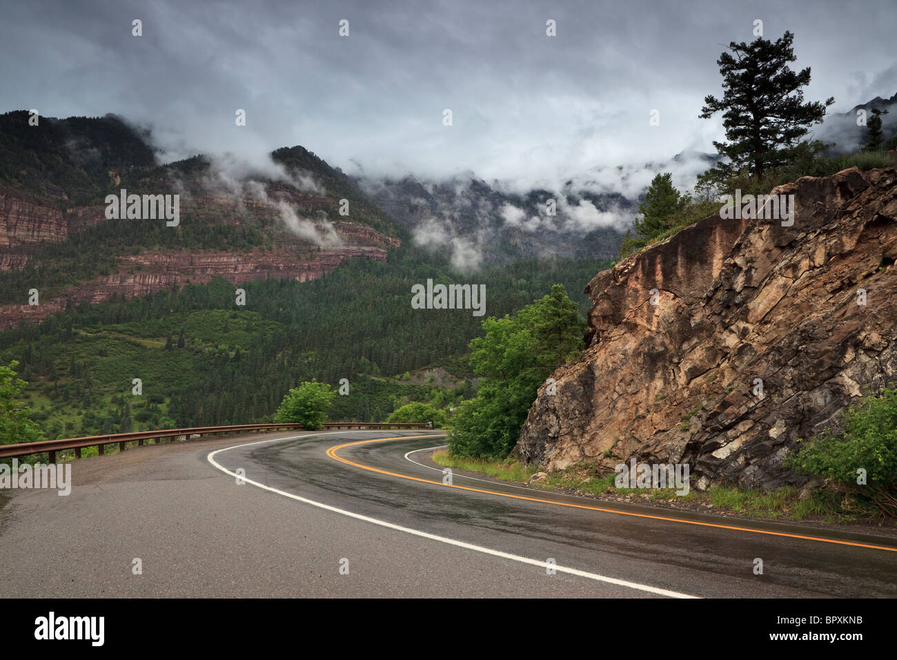 Clouds over a road hi-res stock photography and images - Alamy
