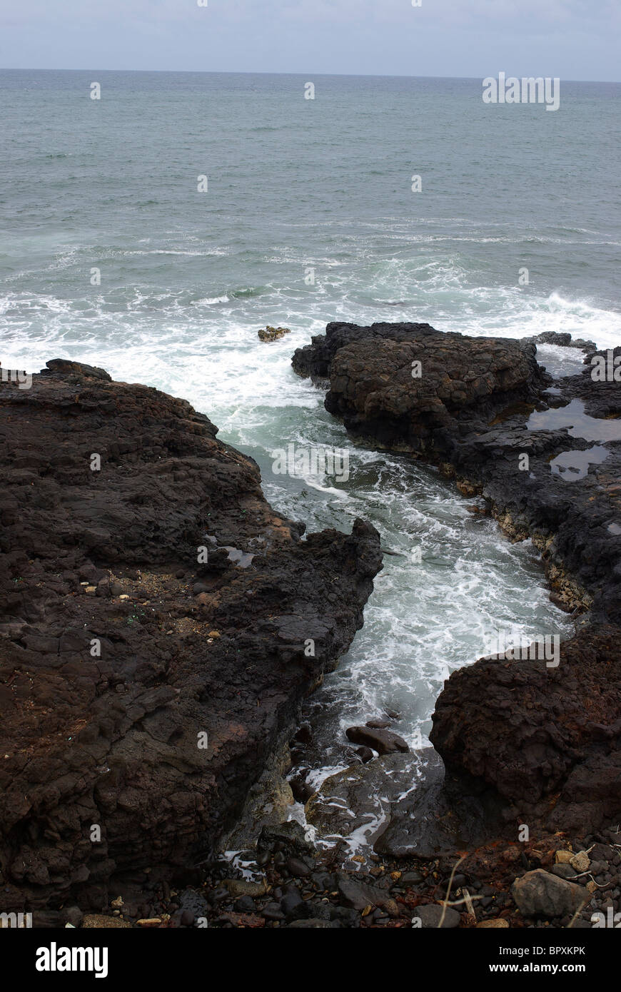 Glass Beach in Hawaii is the site of an old garbage dump. Here the ...