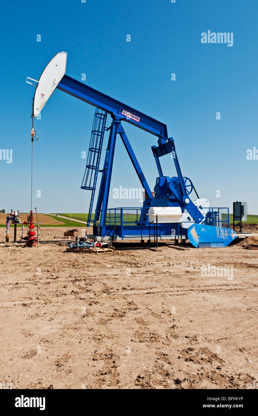 A oilfield pumpjack belonging to N.A.L. Resources pumps crude oil near ...