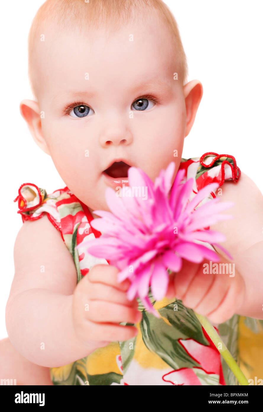 portrait of beautiful baby girl with flower Stock Photo - Alamy