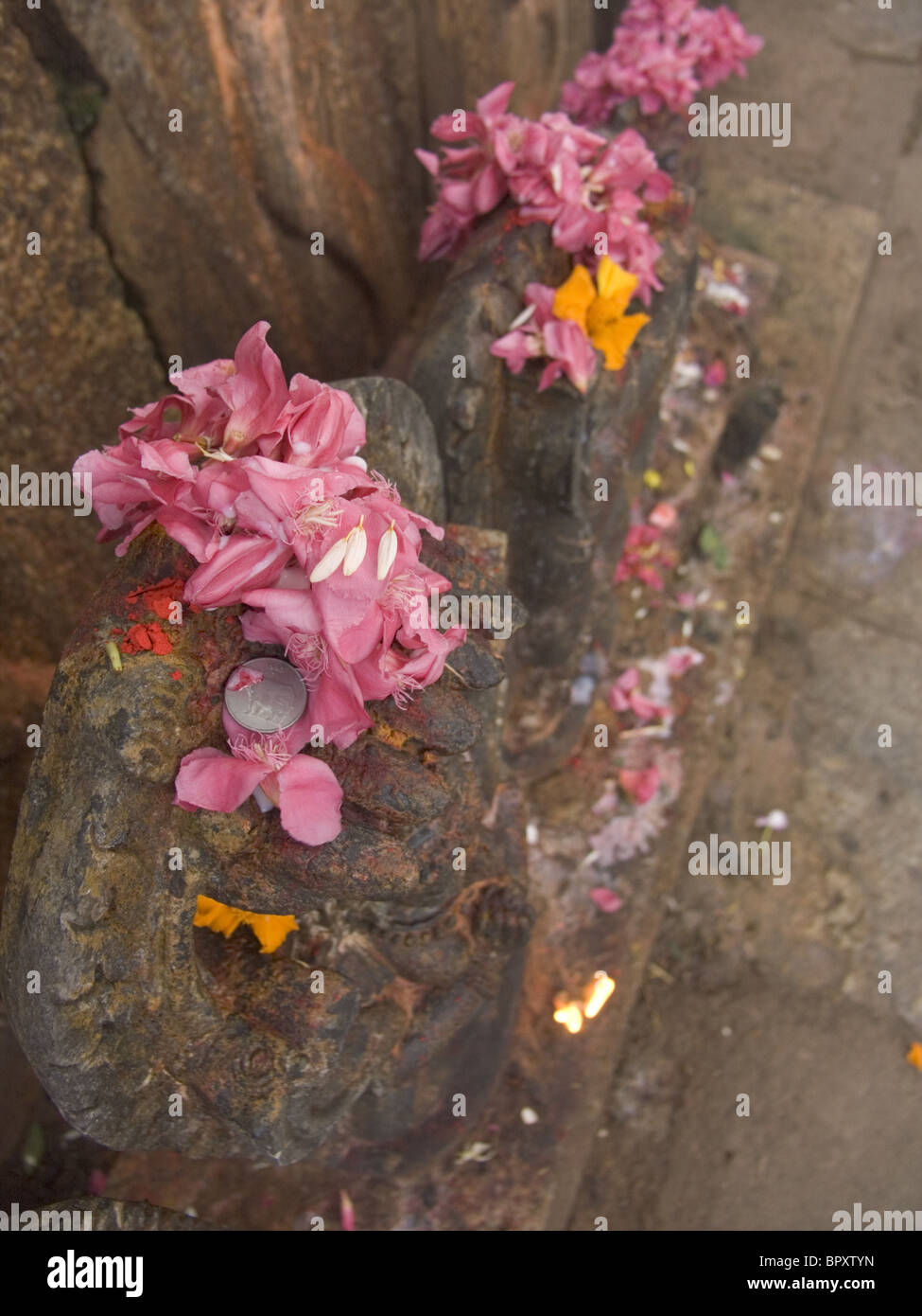 Flowers left as signs of devotion Stock Photo - Alamy
