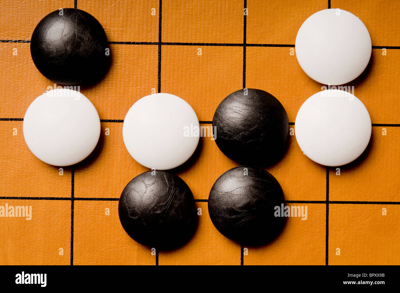 board with a Go game in progress Stock Photo - Alamy