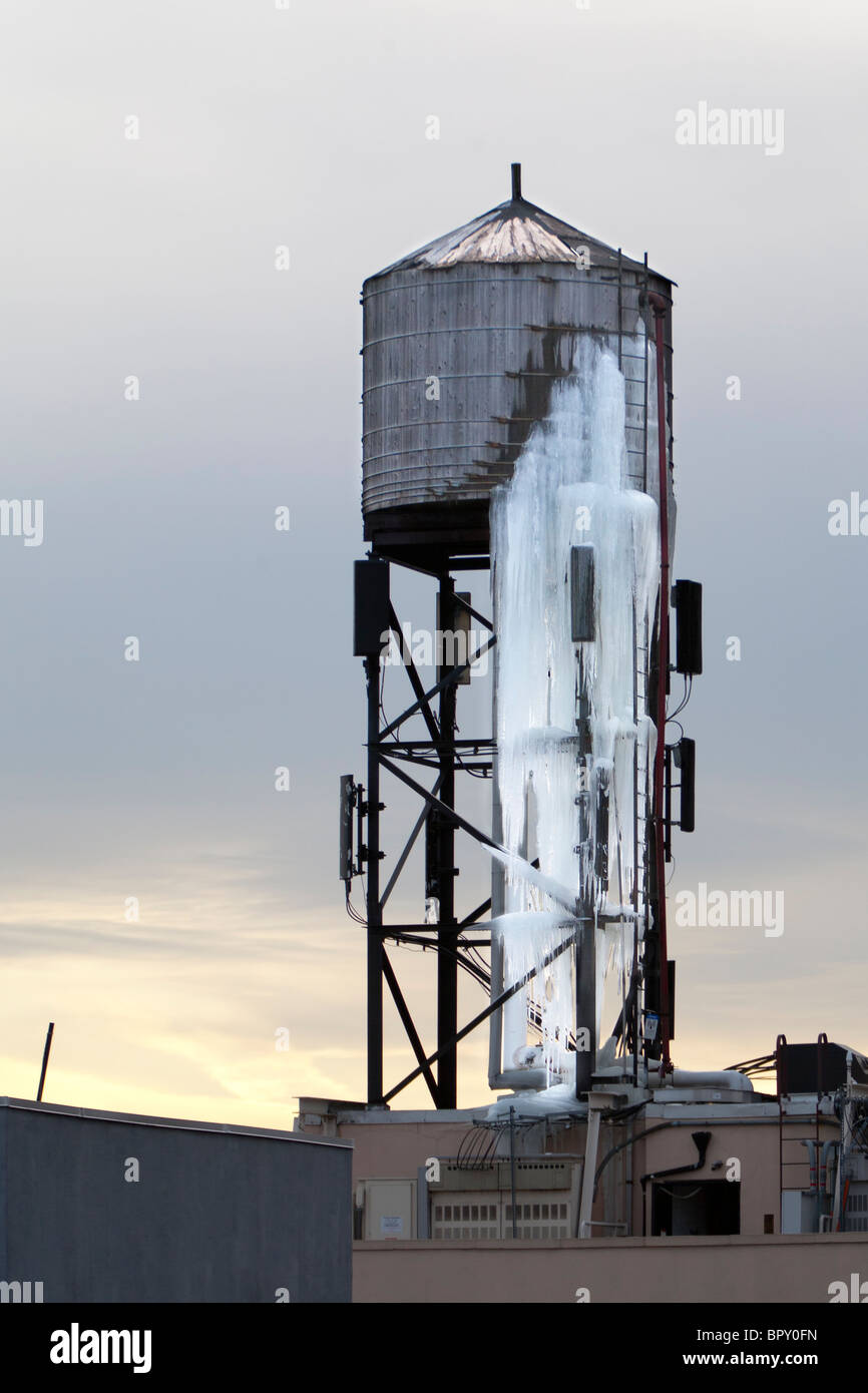 Broken under pressure water tank Stock Photo - Alamy
