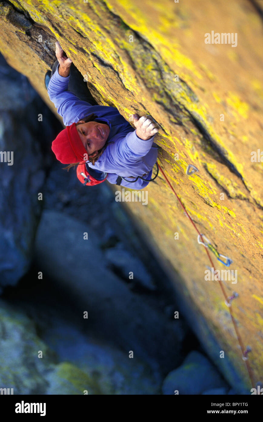 Man lead climbing Stock Photo - Alamy