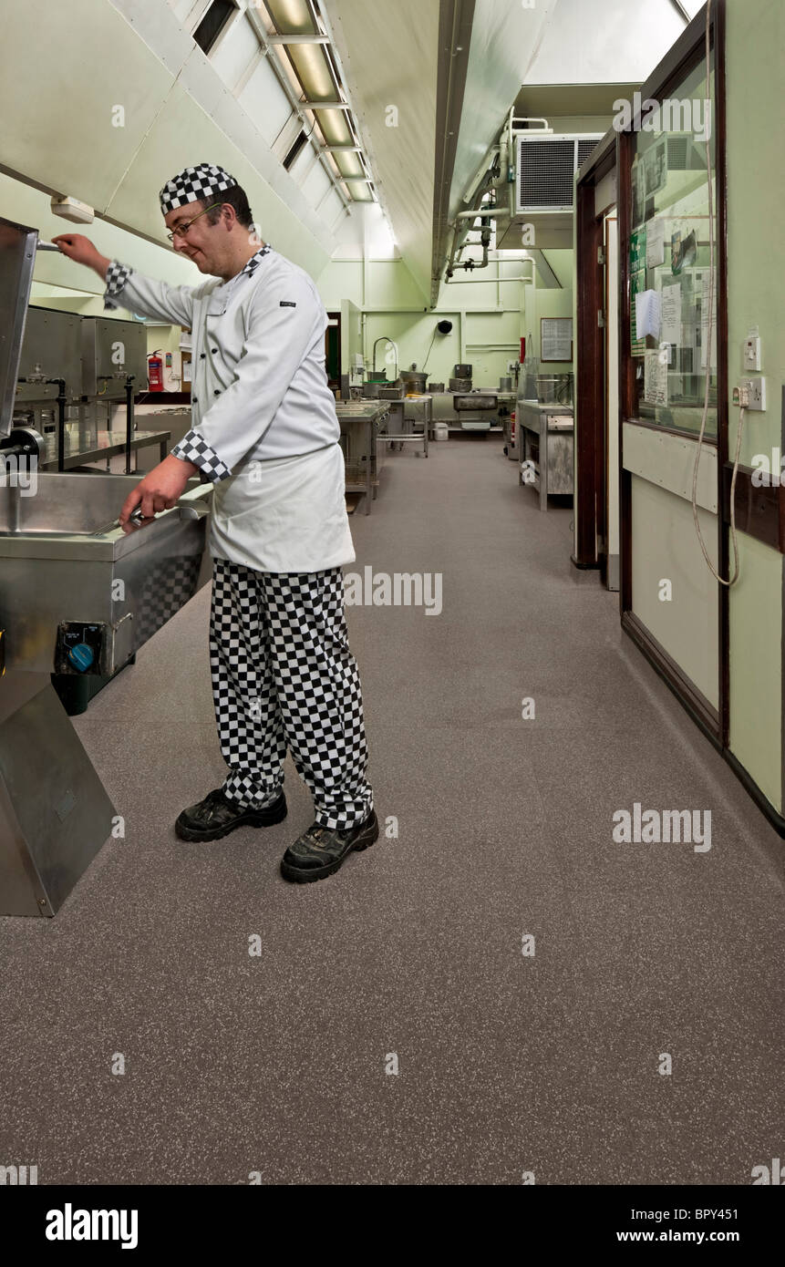 Chef at work in the kitchen at Hinchingbrooke Hospital, Cambridgeshire ...
