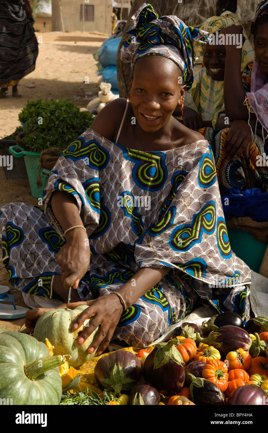 Woman selling fresh produce in the market, Podor, Senegal Stock Photo ...