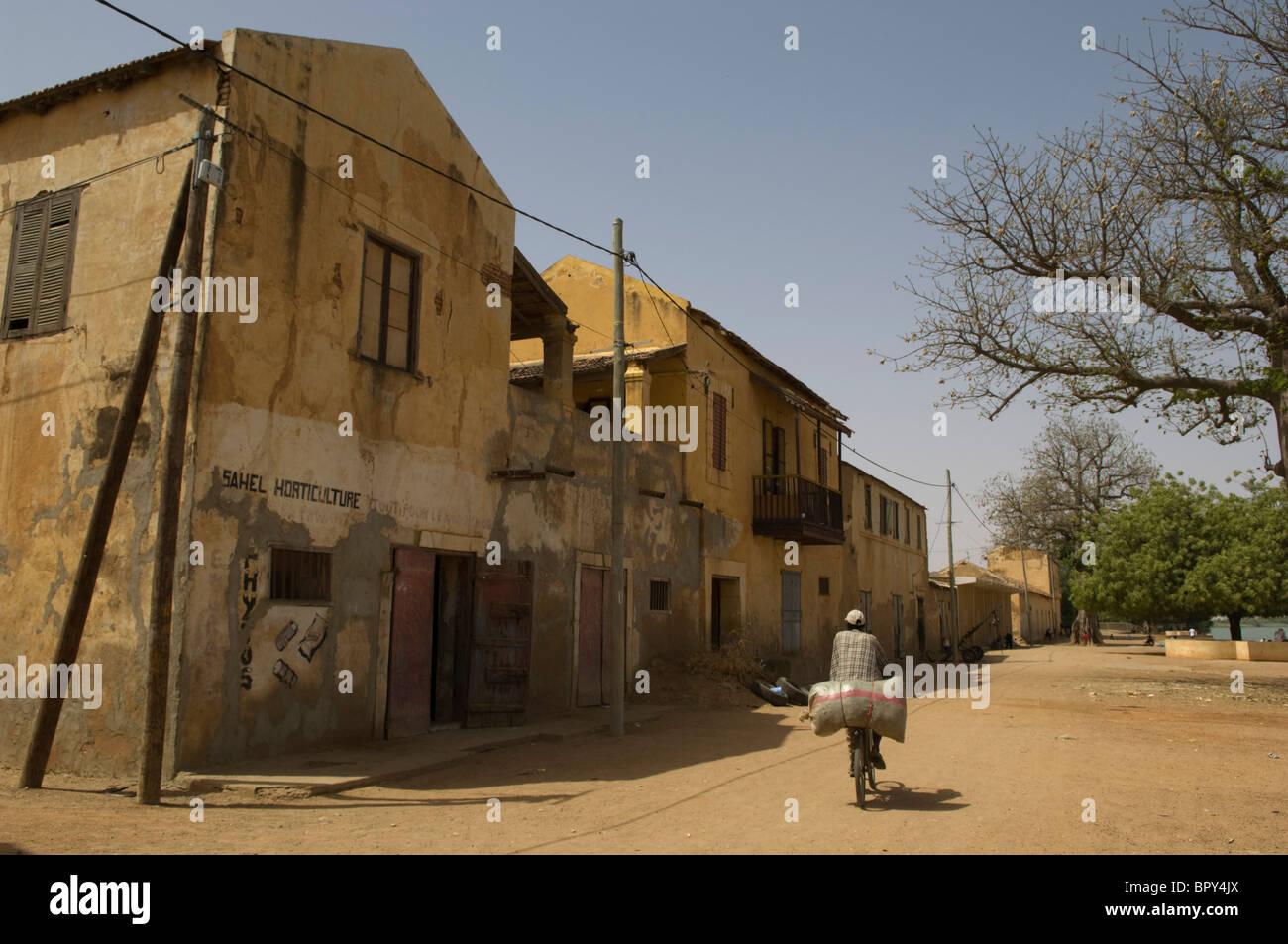 Colonial house on the historical embankment on the Senegal river ...