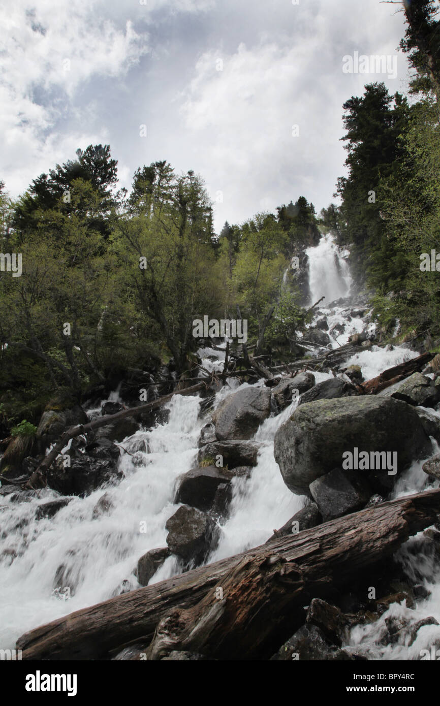 De Ratera waterfalls and alpine forest on Pyrenean Traverse track in ...