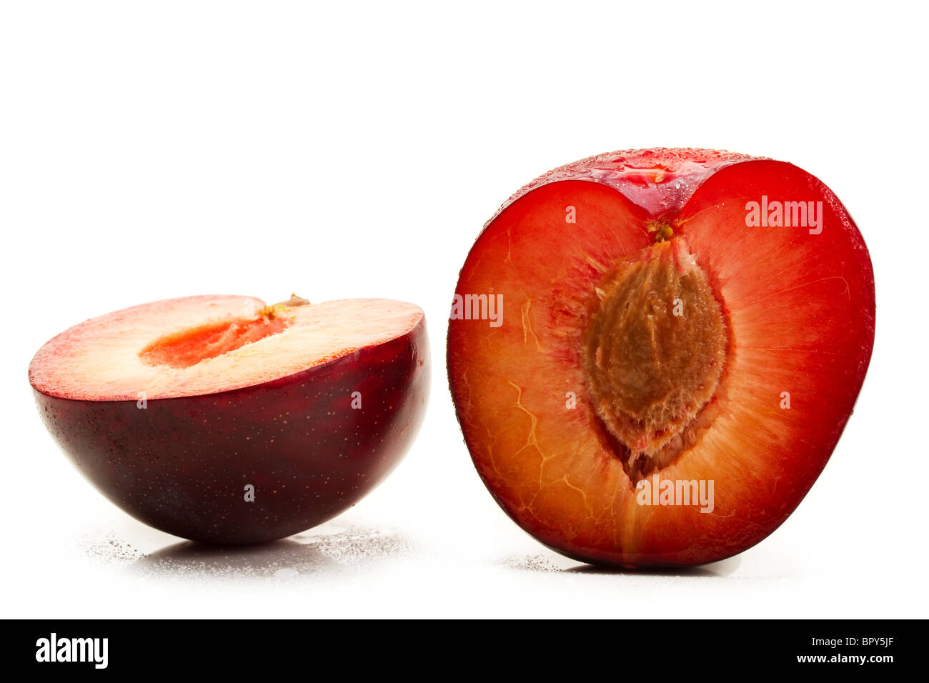 Two ripe plums half hi-res stock photography and images - Alamy