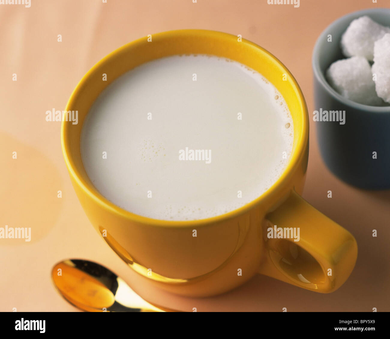 Cup with milk Stock Photo - Alamy