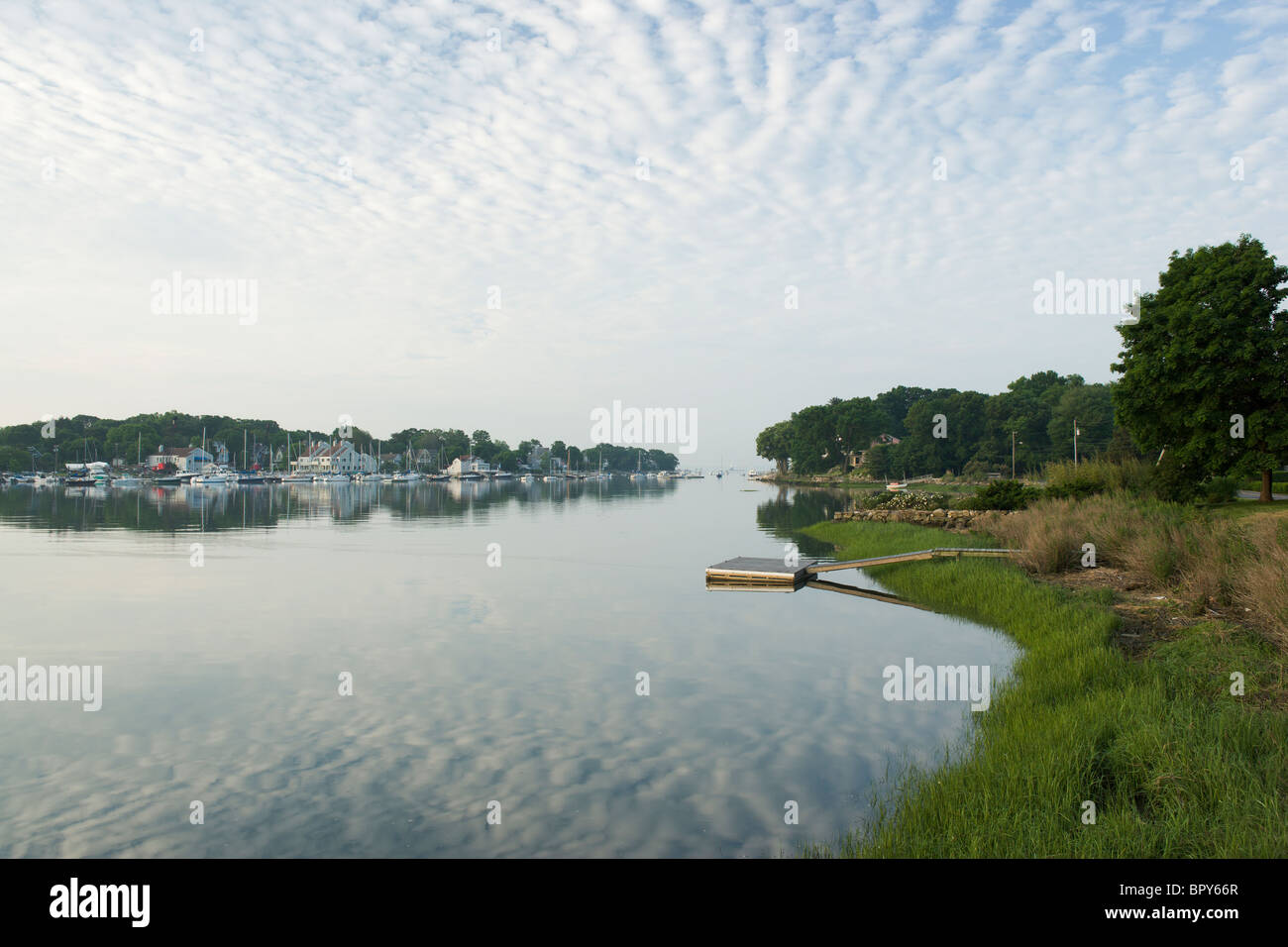 Morning clouds reflect in Five Mile River Stock Photo - Alamy