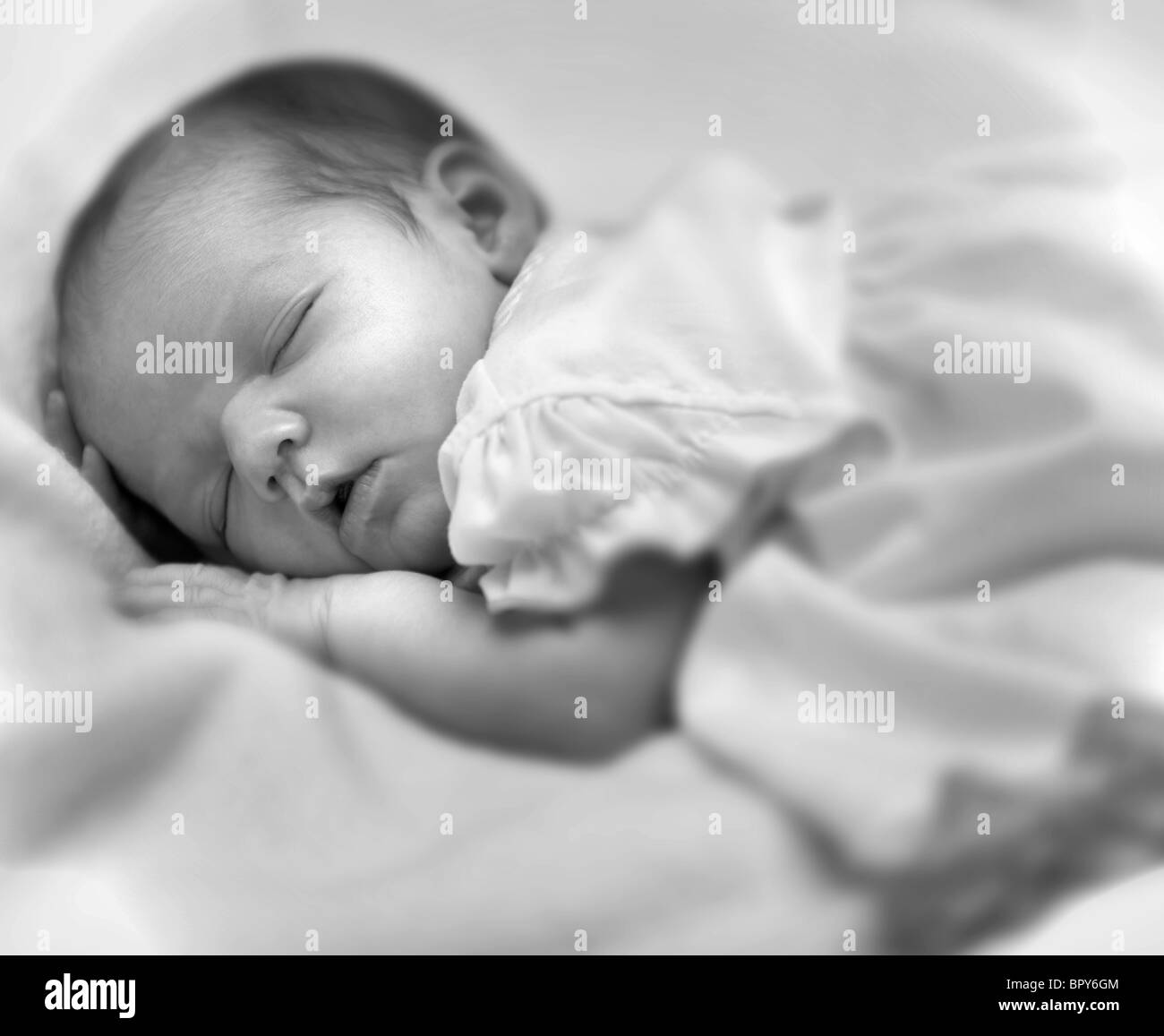 New born baby girl sound asleep Stock Photo - Alamy