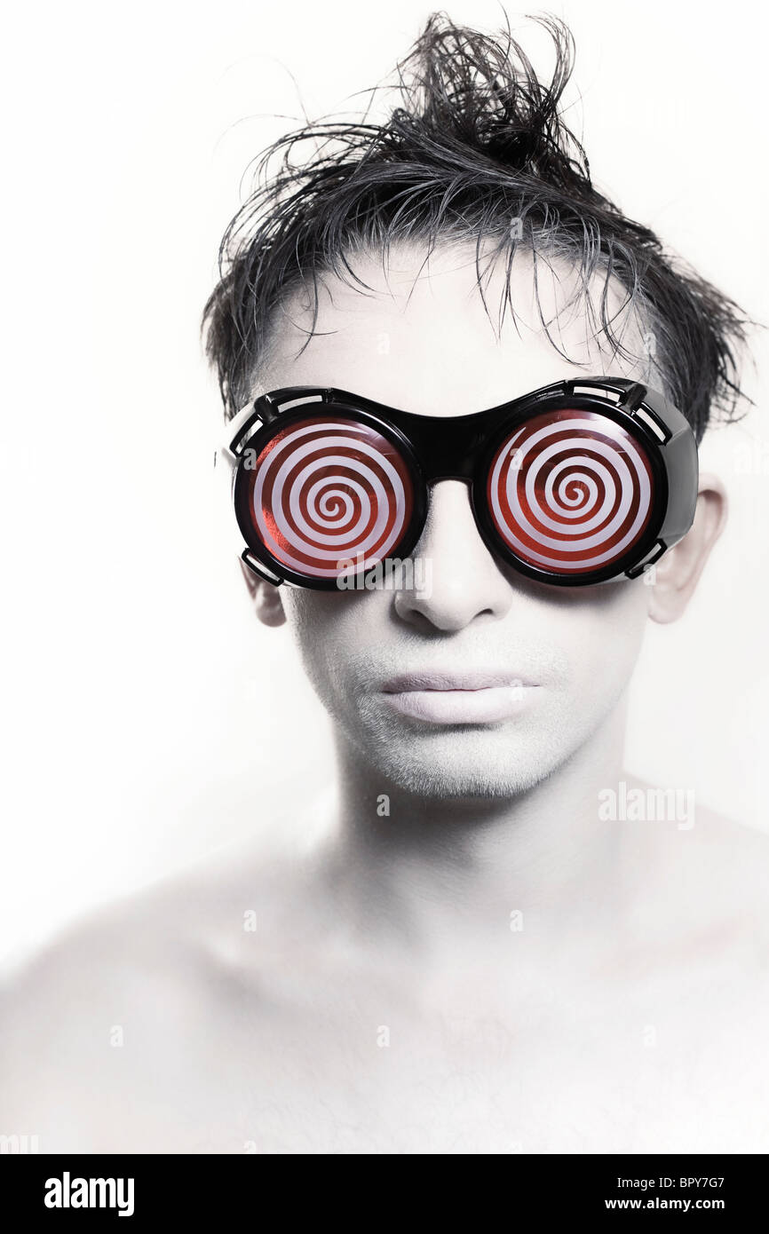 Portrait of a young man with white skin in strange glasses Stock Photo ...