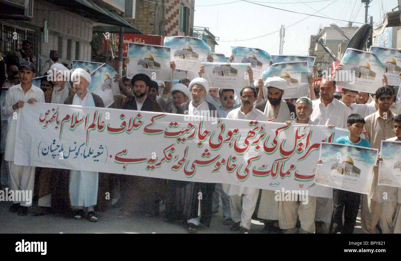 Leaders and supporters of Shia Ulema Council (SUC) pass through a road ...