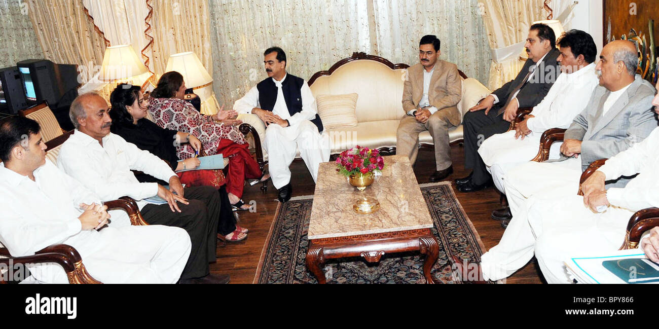 Prime Minister Syed Yousuf Raza Gillani talking to parliamentarians ...