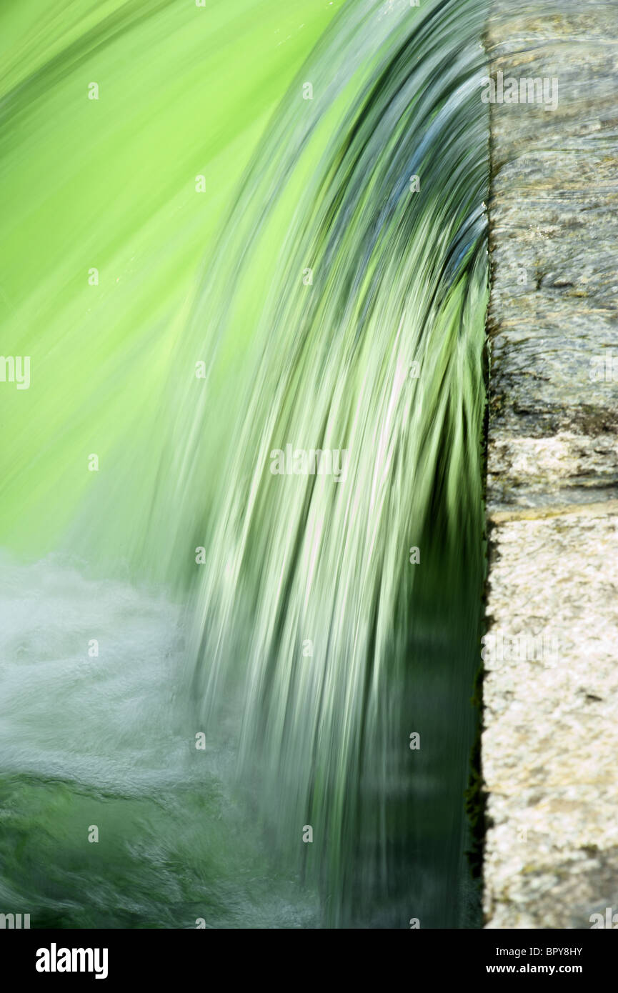 Water falling of a man made edge. Image was tkane at low speed to ...