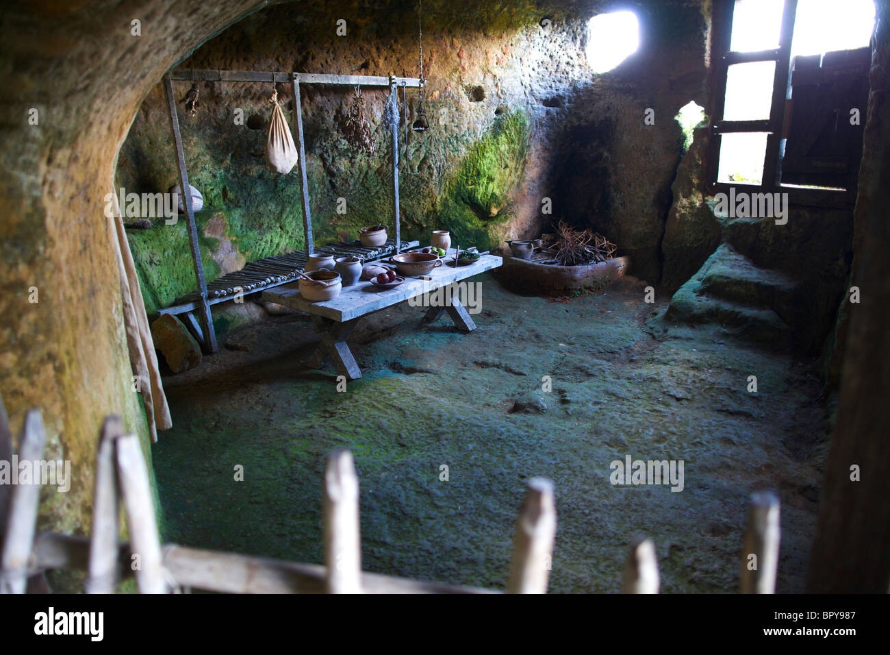 Caves below Commarque castle in the Dordogne France where people would ...