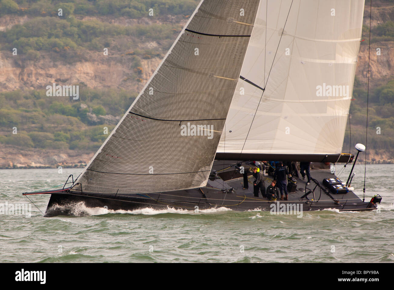 Maxi Yacht Jethou in the Hurst Narrows Isle of Wight UK Stock Photo - Alamy