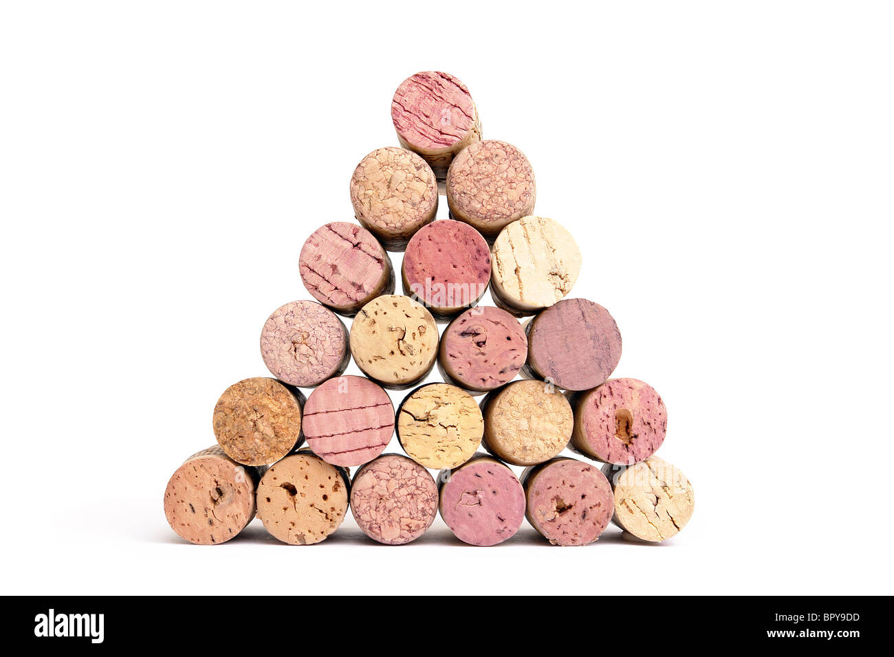 Pyramid of assorted wine corks over white background Stock Photo - Alamy