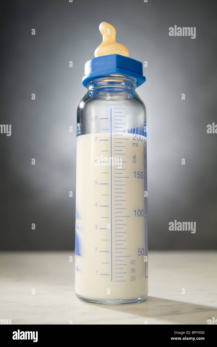 Baby bottle with milk Stock Photo - Alamy
