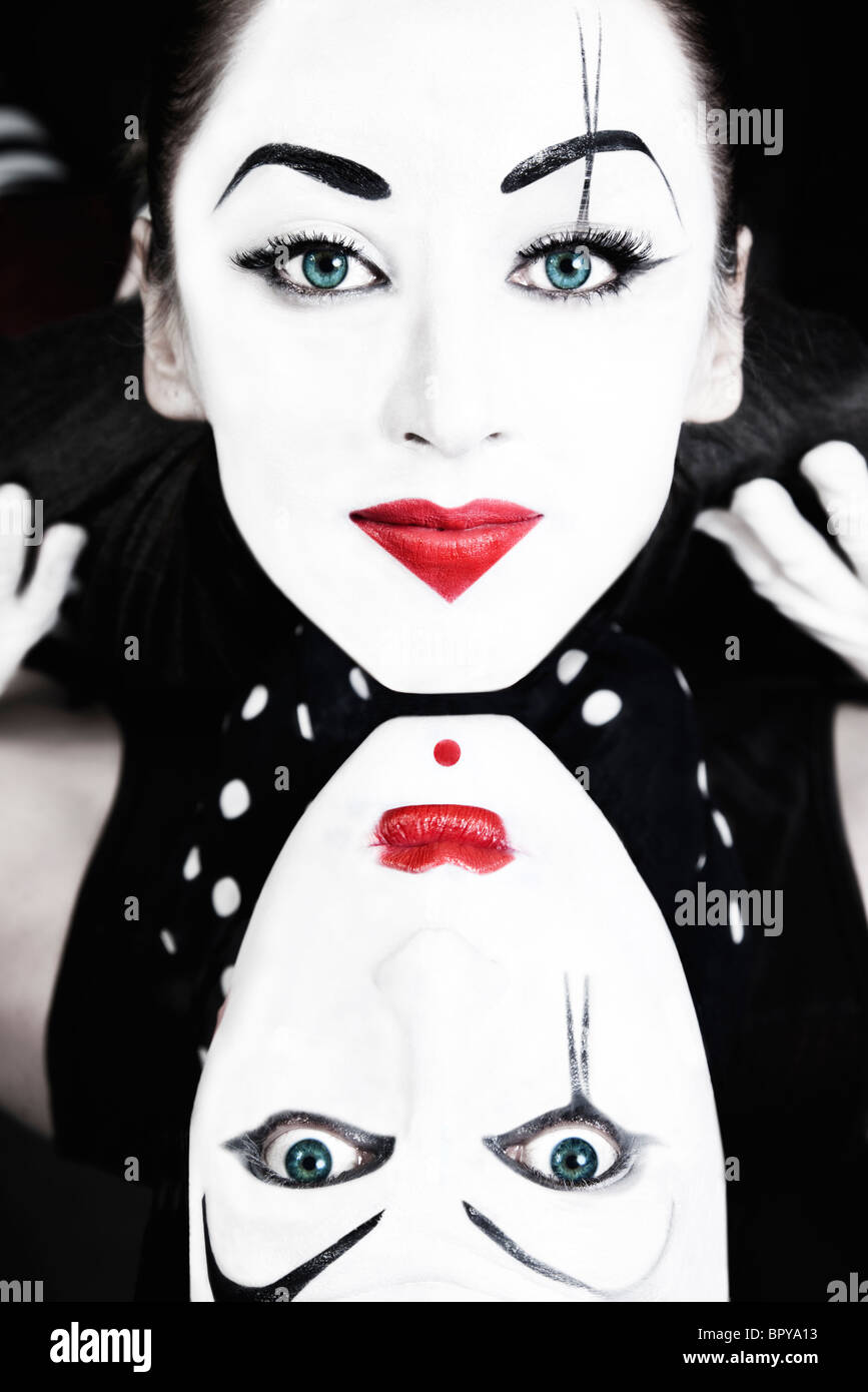 Portrait of two mimes with blue eyes close up Stock Photo - Alamy