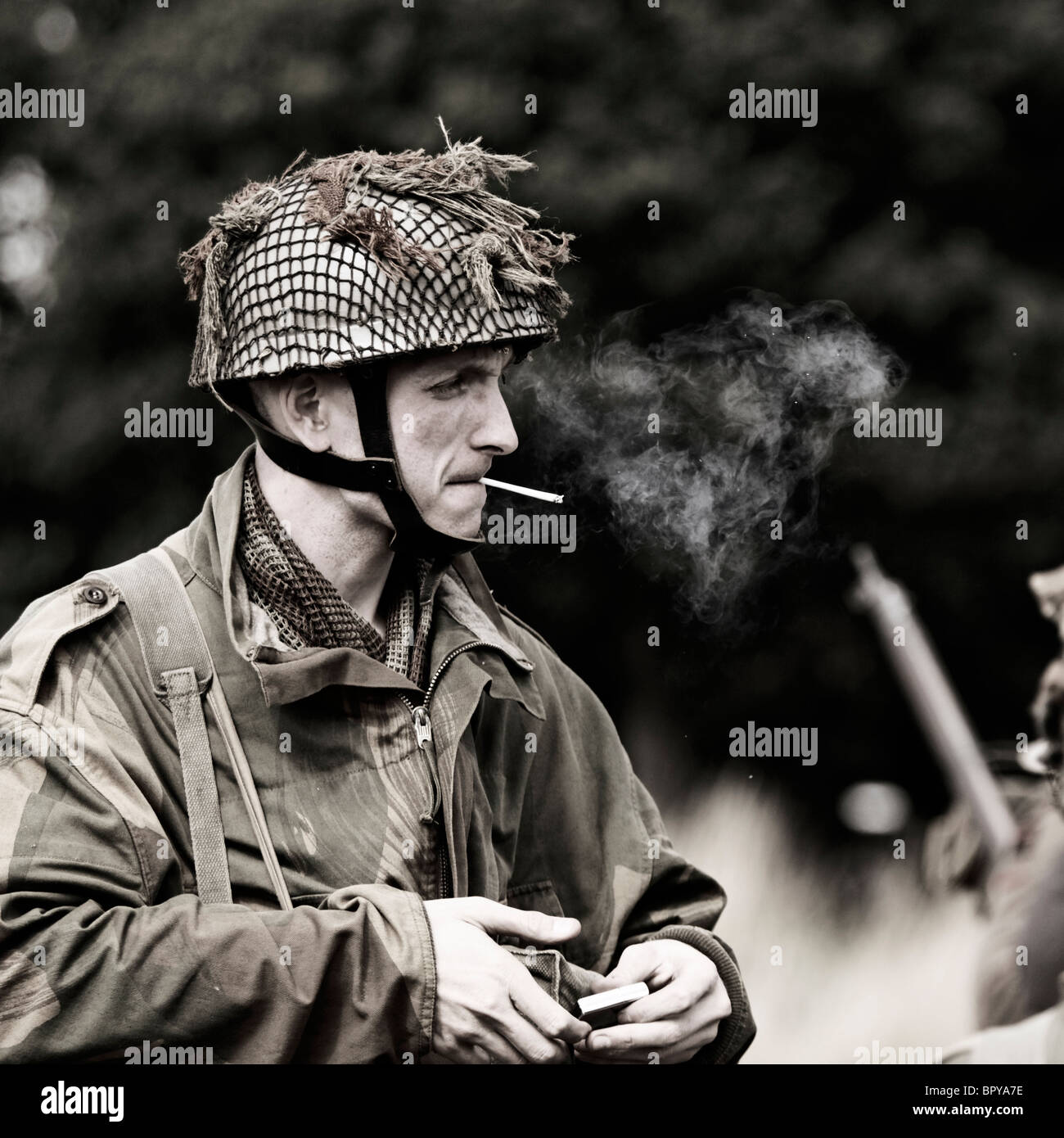 WW2 British Army Parachute Regiment Infantryman Smokes a "roll up Stock ...