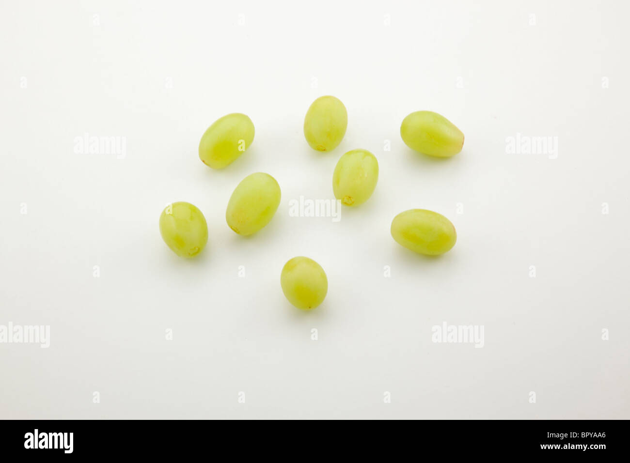 eight green grapes Stock Photo - Alamy