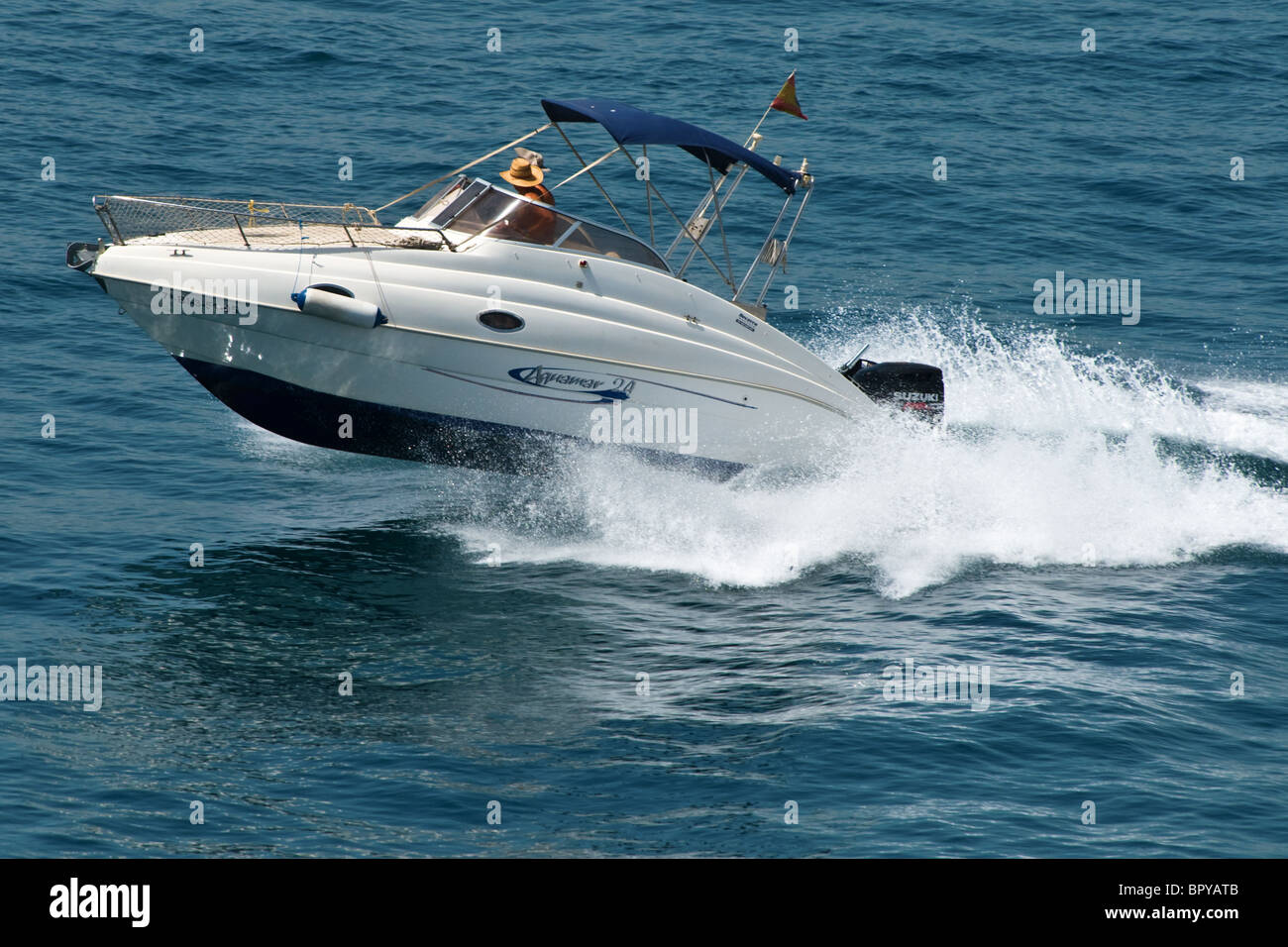 Small pleasure craft going at speed in the bay of Gibraltar Stock Photo ...
