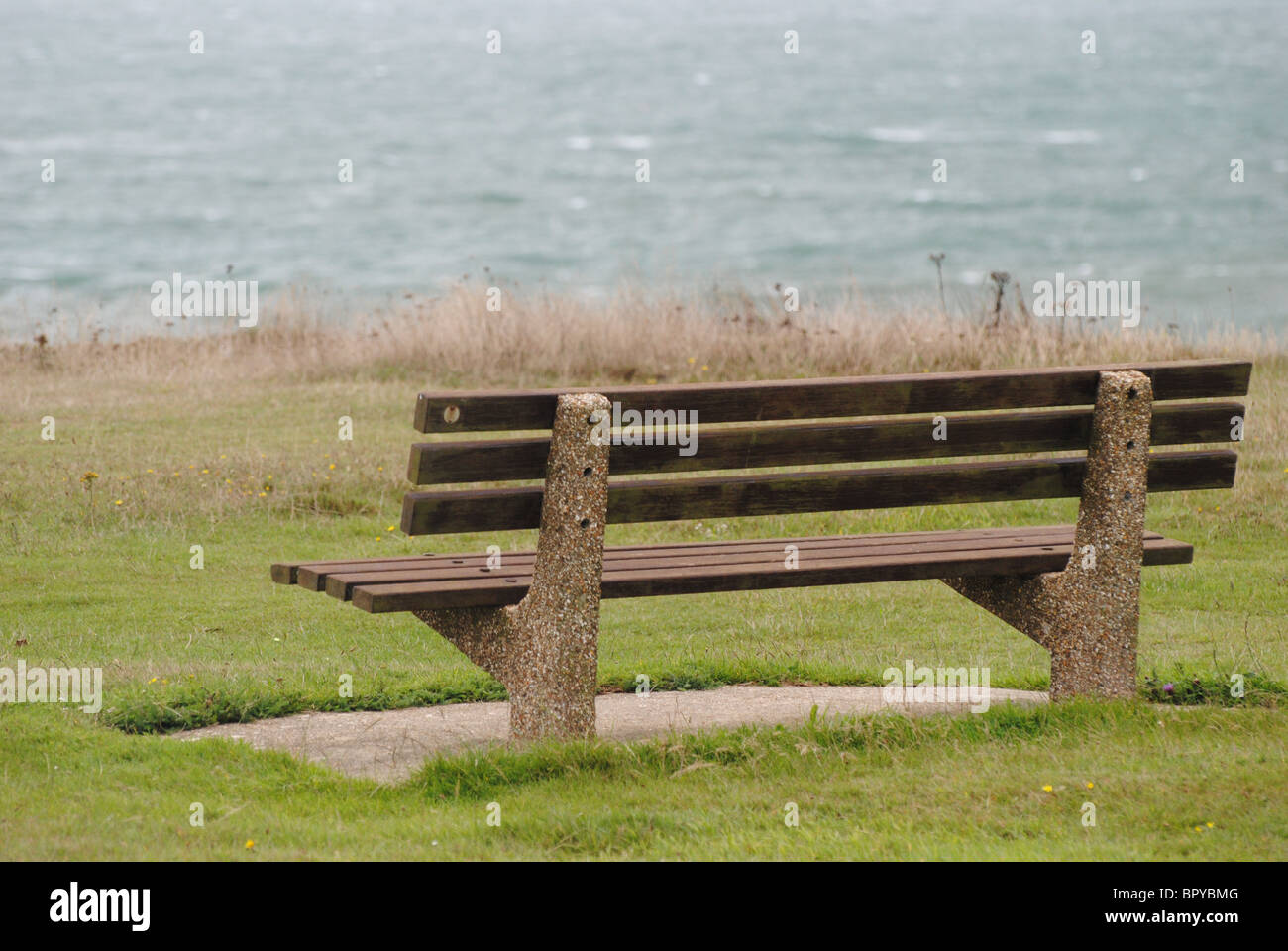 Bench overlooking the sea Stock Photo - Alamy