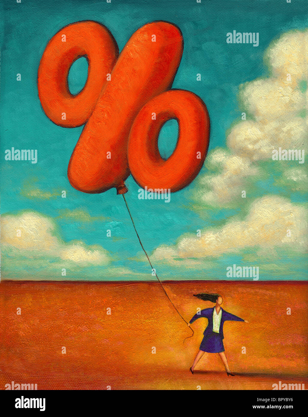 A woman carrying a large percentage balloon Stock Photo - Alamy