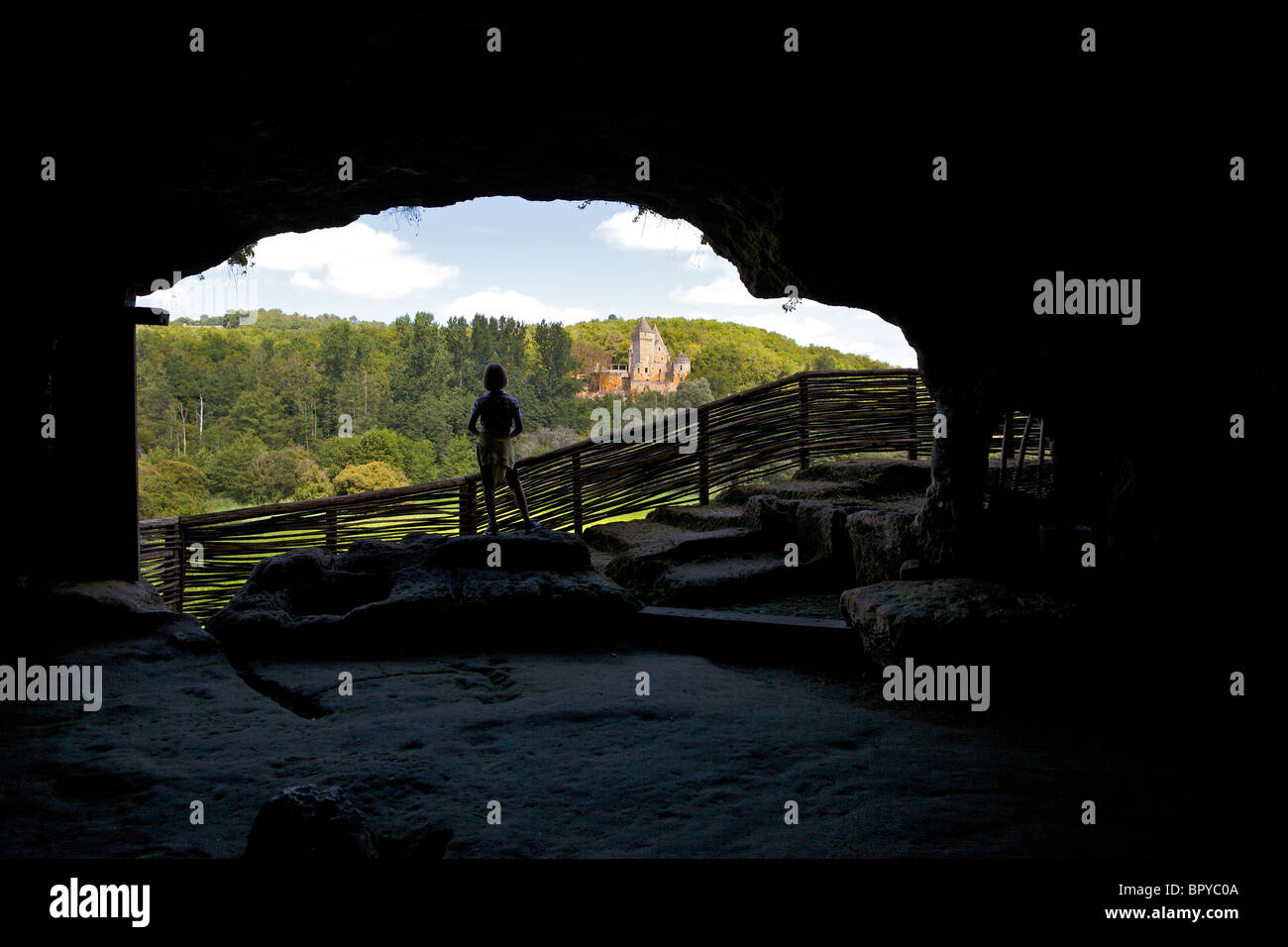 Caves below Commarque castle in the Dordogne France where people would ...